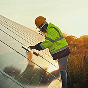 Senior engineer man, solar energy and tablet for typing, analysis or ...