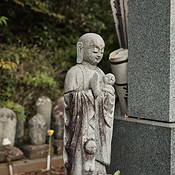 Garden sculpture in traditional Japanese graveyard with peace, calm and ...
