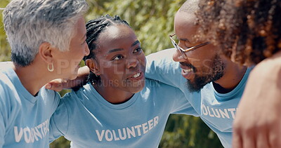 Community, huddle and volunteer team talking outdoor together for charity or welfare planning ...