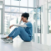 Nurse, stress and woman with depression in hospital for fail, mistake ...