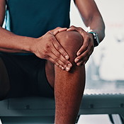 Gym, knee pain and man with fitness, leg injury and sports with athlete ...