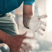 Man, hands and clapping chalk in fitness, preparation or getting ready ...