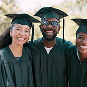 Face, graduation and happy group of students in university, laugh and ...