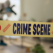 Crime scene tape, photography and people in house for evidence ...