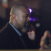 Police, man and phone call for talking at crime scene, investigation ...