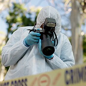 Csi, photographer and police tape at crime scene for investigation in ...