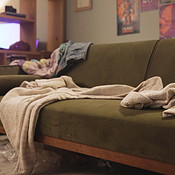 Dirty, garbage and messy living room in house with couch and fast food ...