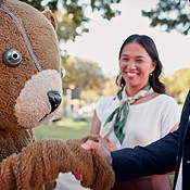 Businessman, mascot and smile with handshake in outdoor for ...