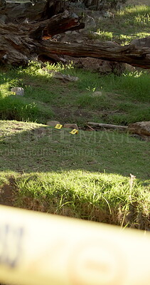Outdoor, grass and numbers on crime scene for investigation, warning ...