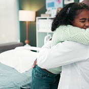 Family, doctor and father hug child for relationship, bonding and ...