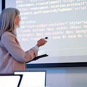Female teacher, coding and screen on campus for education with html ...