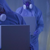 People, hazmat suit and chemical waste in box for investigation ...
