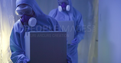 People, hazmat suit and chemical waste in box for investigation ...