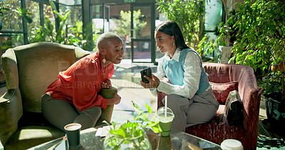 Cafe, phone and woman friends laughing at social media meme, joke or ...