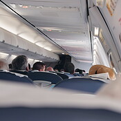 People, sitting and passengers with plane for flight with commercial ...