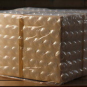 Logistics, delivery and box with bubble wrap on floor for ecommerce ...