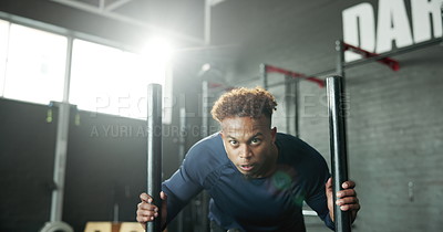 Prowler sled, fitness and man in gym, wellness and power with exercise ...