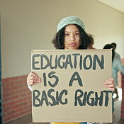School, education and face of girl with placard, signboard and poster ...
