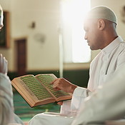People, reading and learning quran in mosque with listening ...