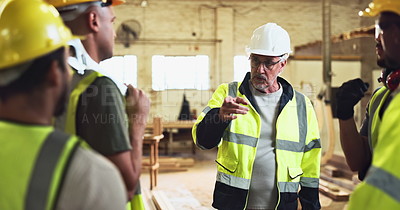 Construction team, briefing and safety instructions on site for ...