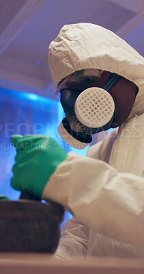 Person, mixing and grinding powder in lab for methamphetamine, chemical ...