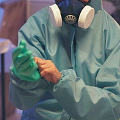 Science, lab and woman in hazmat suit with toxic chemicals for cooking ...