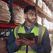 Logistics, man and tablet in warehouse for order, checklist and ...