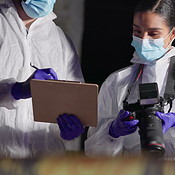 Forensic, team and clipboard on crime scene for discussion, legal ...