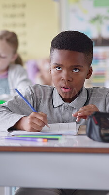 Boy, child and math test in classroom, counting fingers and ...
