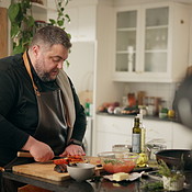Chef, content creator and man in kitchen for cooking dinner, cuisine ...