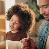 Holding hands, family and praying for food, child and benefits of ...