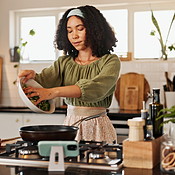 Cooking, live stream and woman in kitchen with phone, food and online ...