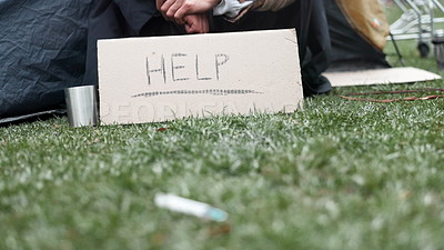 Poverty, sign and help for charity with drug needle, heroin and addict ...