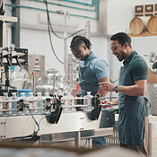 Bottle, inspection and distillery with man and conveyor belt for ...
