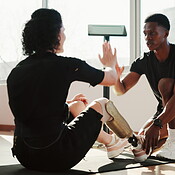 Fitness, high five or prosthetic with personal trainer and woman in ...