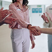 Business, people and handshake with nurse in clinic for medical support ...