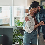 Programmer, business people hug and friends fist bump to leave office ...