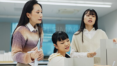 Group, women and architecture with building model for floor plan, real ...
