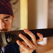 Japanese man, samurai and hands with sword for martial arts, culture ...
