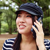 Japanese woman, park and conversation with phone call for talking ...