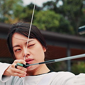 Archer, aim and woman with outdoor training, target practice and ...