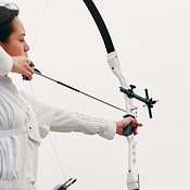 Archery, aim and girl with outdoor training, target practice and ...