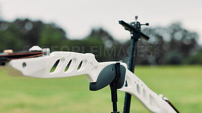 Archery, bow and sport in field for game, challenge and target practice ...