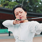 Archery, focus and girl with outdoor training, target practice and ...