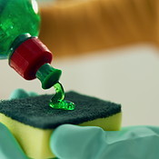 Sponge, spring cleaning and person with liquid, home and detergent with ...