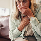 Elderly woman, cough and chest pain in home, lung disease and ...