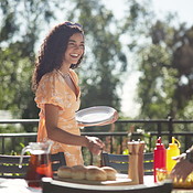Conversation, outdoor and friends setting table at barbecue for social ...