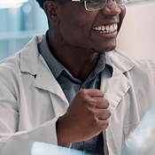 Team, scientist and celebration in lab for research results, medical ...