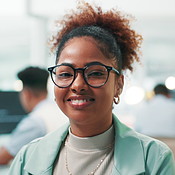Happy woman, face and software developer with glasses for coding or app ...