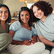Face, friends and women on sofa for bonding, connection and chilling ...